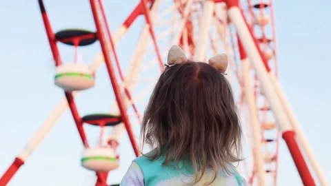 Cute little girl back view looking up at... | Stock Video | Pond5