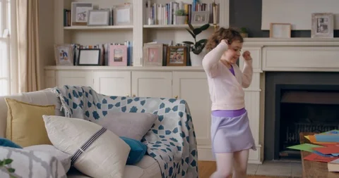 cute little girl dancing at home having ... | Stock Video | Pond5