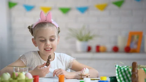 Cute little girl enjoying taste and arom... | Stock Video | Pond5