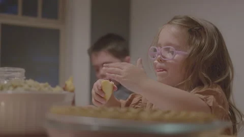 Cute Little Girl in Glass Eating Dinner ... | Stock Video | Pond5