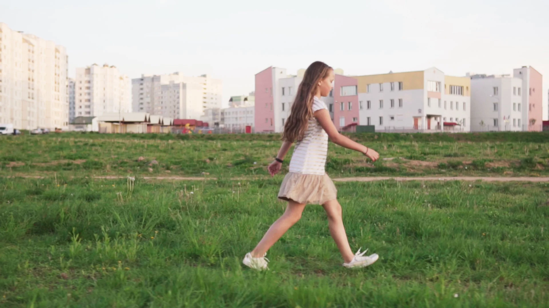 Little Girl Walking Side View
