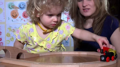 Cute little girl with young mother pushi... | Stock Video | Pond5