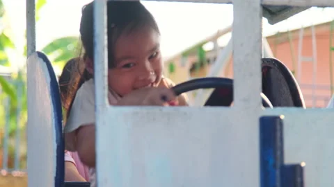 Cute little girls driving a train in the... | Stock Video | Pond5