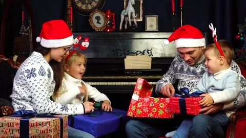 Kids Opening Presents Stock Footage ~ Royalty Free Stock Videos | Pond5