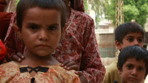 Cute Refugee Girls Pose for the Camera | Stock Video | Pond5