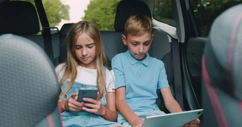 Cute relaxed teen boy and girl sitting o... | Stock Video | Pond5