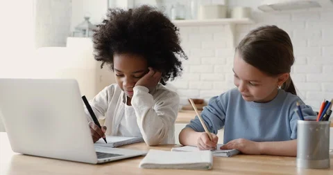 Cute school girls of mixed ethnicity stu... | Stock Video | Pond5
