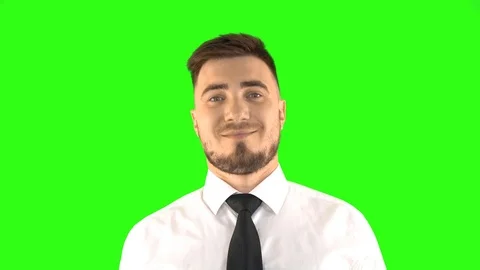 Cute Smiling Man in White Shirt Shows Th... | Stock Video | Pond5