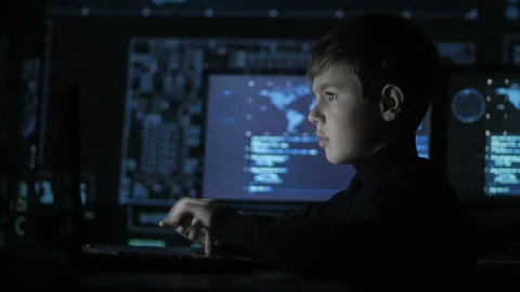 Cute teen boy programmer working at a co... | Stock Video | Pond5