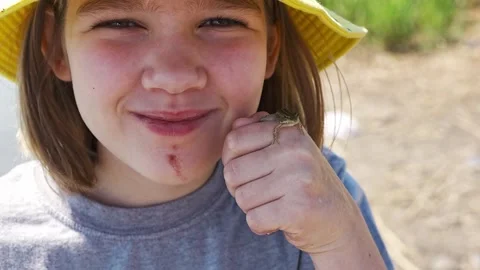 Cute teenage girl with broken chin holdi... | Stock Video | Pond5