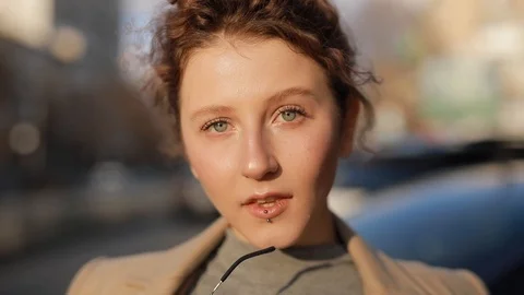 Cute unconventional woman portrait gazin... | Stock Video | Pond5