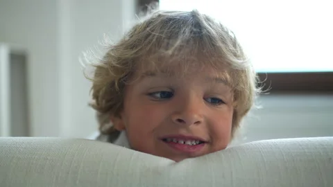 Cute young boy portrait face picking out... | Stock Video | Pond5