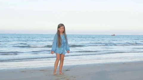 Cute young girl doing middle split on th... | Stock Video | Pond5