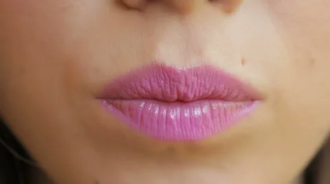 cute young girl plays with her lips: lip... | Stock Video | Pond5