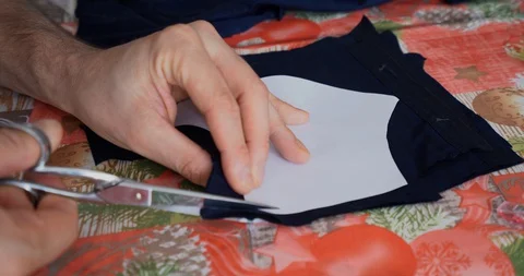 cutting fabric according to sewing patte... | Stock Video | Pond5