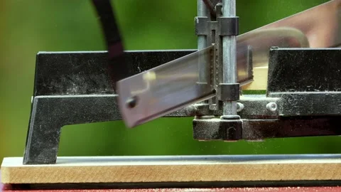 Cutting a picture frame moulding with a ... | Stock Video | Pond5