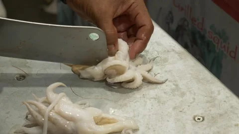 cutting processing cuttlefish on counter... | Stock Video | Pond5