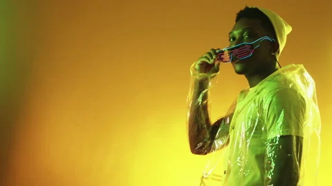 cyberpunk fashion neon people guy in par... | Stock Video | Pond5