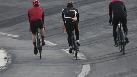 cyclists ride on the track, coaching | Stock Video | Pond5