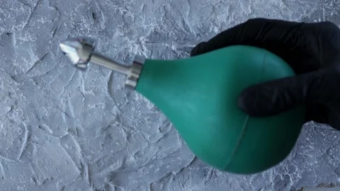 Cylinder Politzer for blowing off of ear... | Stock Video | Pond5