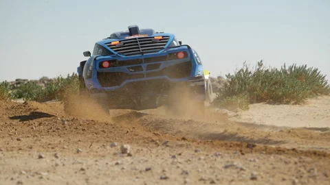 Dakar Rally Cars Racing On The Dusty Cur... | Stock Video | Pond5