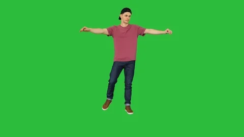 The dancer does wave his arms on a Green... | Stock Video | Pond5