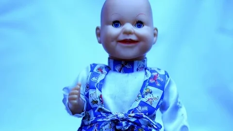 Dancing doll with blue eyes | Stock Video | Pond5
