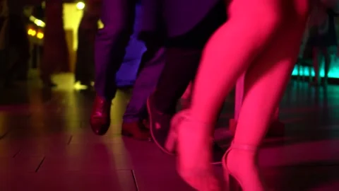 Dancing feet at a party forming a train | Stock Video | Pond5