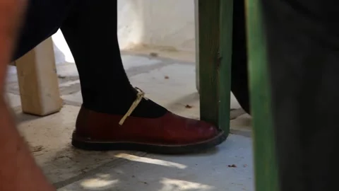 Dancing feet (shoes) under the table. | Stock Video | Pond5