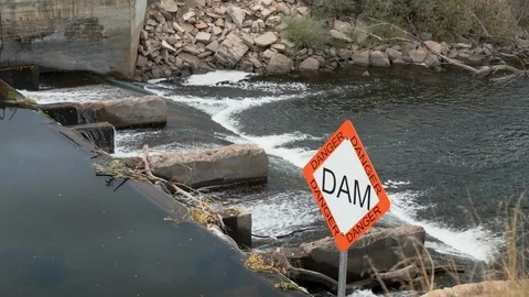Danger dam warning sign above water dive... | Stock Video | Pond5
