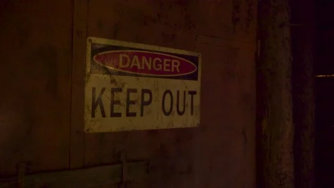 A danger sign on the gate of the mining ... | Stock Video | Pond5