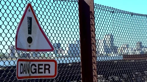 Danger warning sign displayed on chain-l... | Stock Video | Pond5