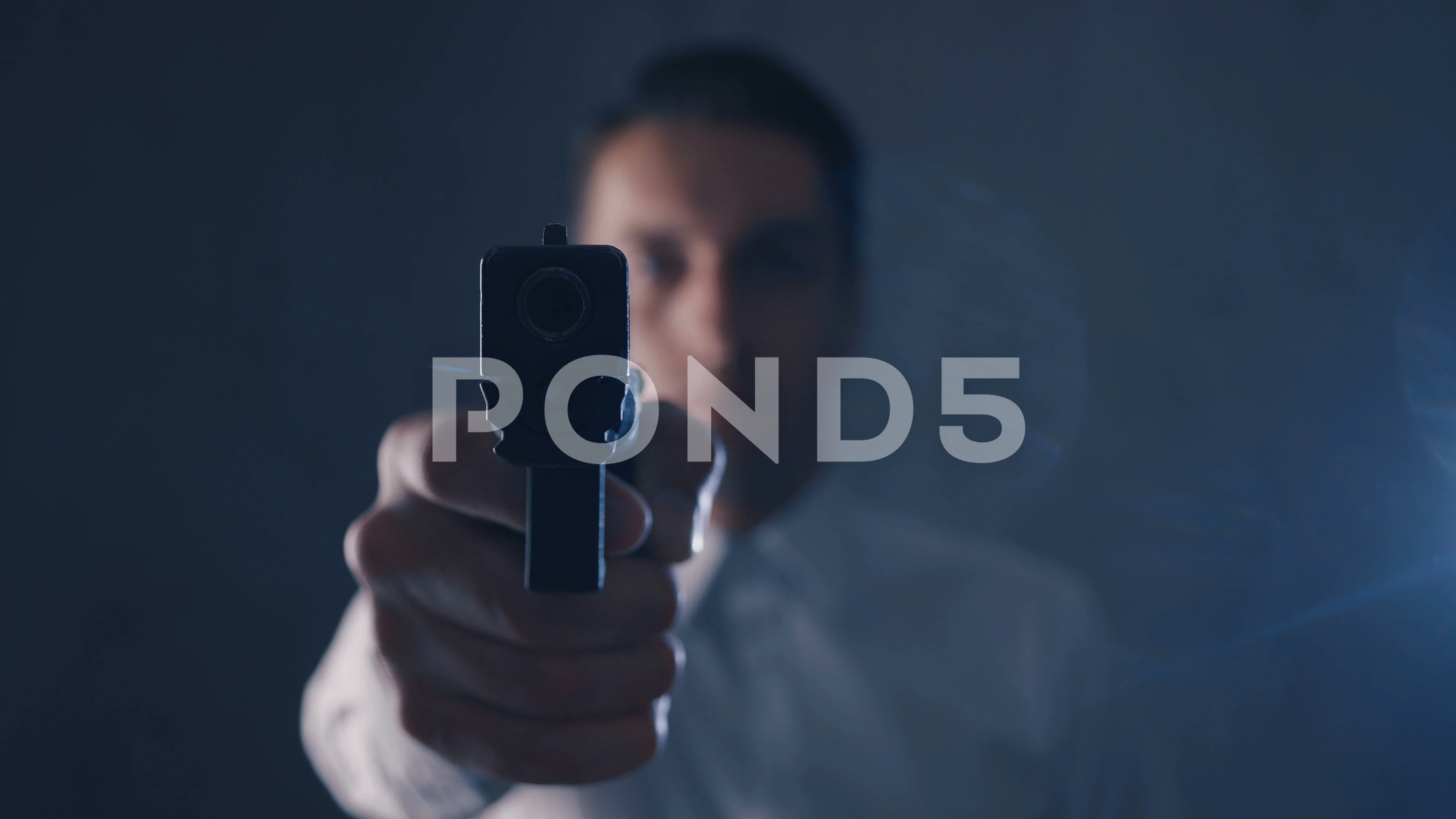 Revolver Pointing At Camera