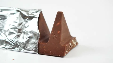 dark chocolate in a packet on white back... | Stock Video | Pond5