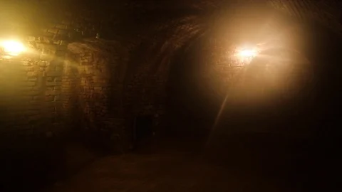 Dark humid creepy cellar with dim light.... | Stock Video | Pond5