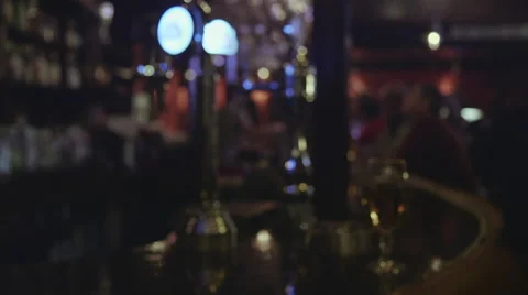Dark moody night bar overview out of foc... | Stock Video | Pond5