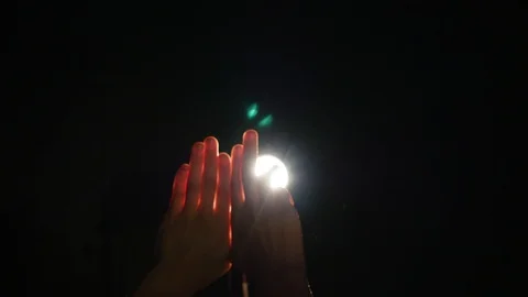 dark silhouette of human male hand with ... | Stock Video | Pond5