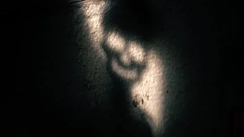 Dark skeleton ghost face shadow on backg... | Stock Video | Pond5