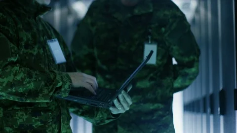 In Data Center Two Military Men Work wit... | Stock Video | Pond5