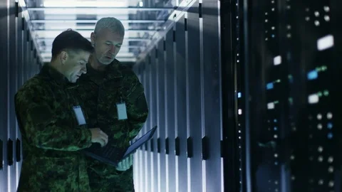 In Data Center Two Military Men Work wit... | Stock Video | Pond5