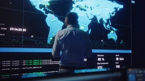 Data Scientist Looks at Global Map Chart... | Stock Video | Pond5