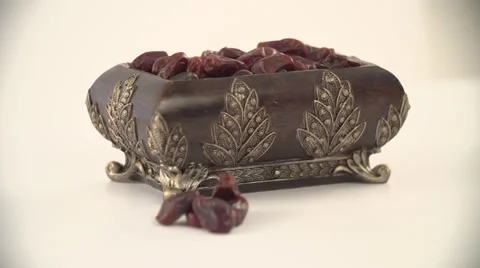 Dates in antique container. | Stock Video | Pond5