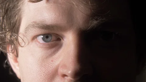 Dawn of Men face reveal lighting dramati... | Stock Video | Pond5