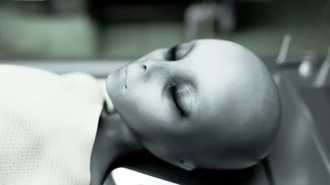The dead alien in the morgue on the tabl... | Stock Video | Pond5