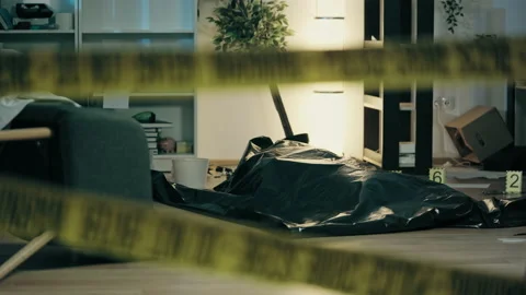 Dead body on floor in plastic bag, evide... | Stock Video | Pond5