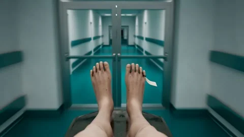 A dead man on a hospital bed. Corps on a... | Stock Video | Pond5