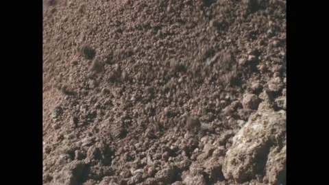 Decade: Dirt falling from backhoe. Stone... | Stock Video | Pond5