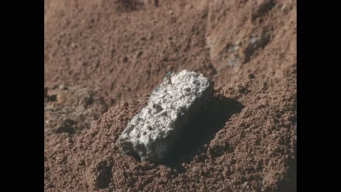 Decade: Dirt falling from backhoe. Stone... | Stock Video | Pond5