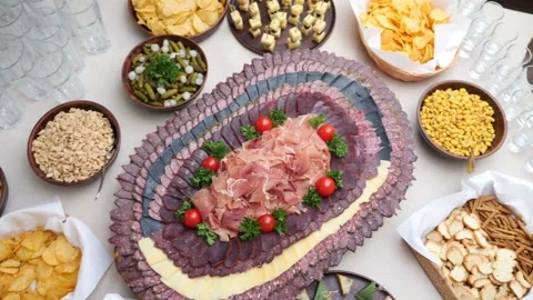 Decoration of the buffet table with meat... | Stock Video | Pond5