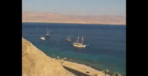 Deep blue sea from a window with yachts... | Stock Video | Pond5